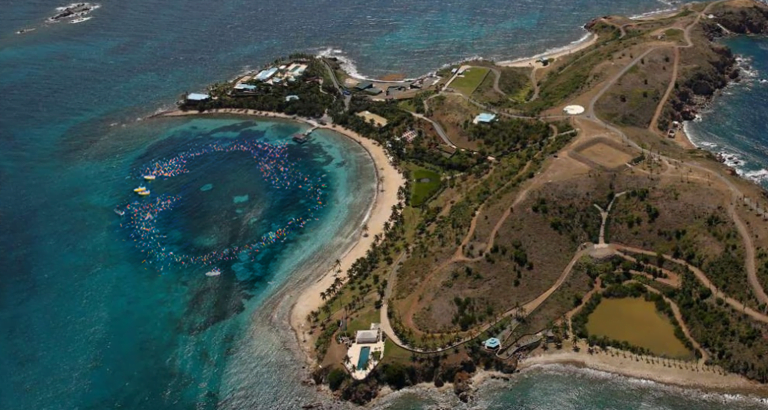 Thousands Gather in the Waters of Little Saint James to Commemorate ...